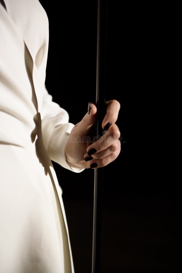 Back View of a Singer with Microphone Singing a Song on Stage in White ...