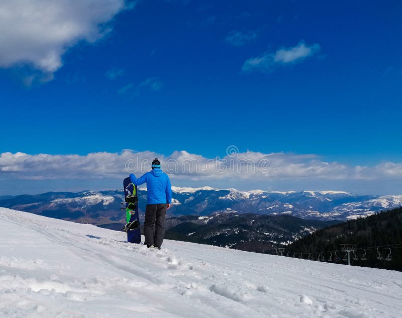 Back View of a Snowboarder on a Slope Stock Photo - Image of sports ...