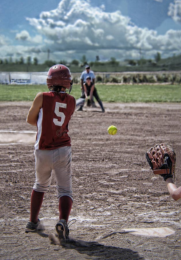 Back View of Softball Player after Swinging Bat Stock Photo - Image of ...