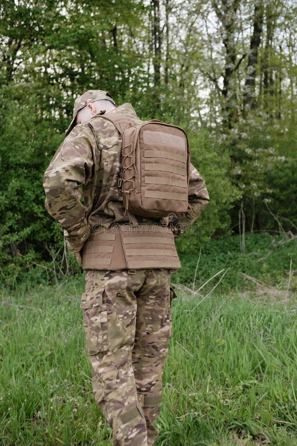 Back View of Soldier with Full Gear and Tactical Backpack Standing ...