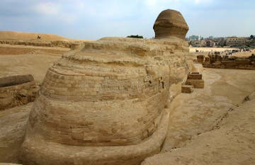 Back View of the Sphinx Next To Pyramids, Egypt Stock Photo - Image of ...