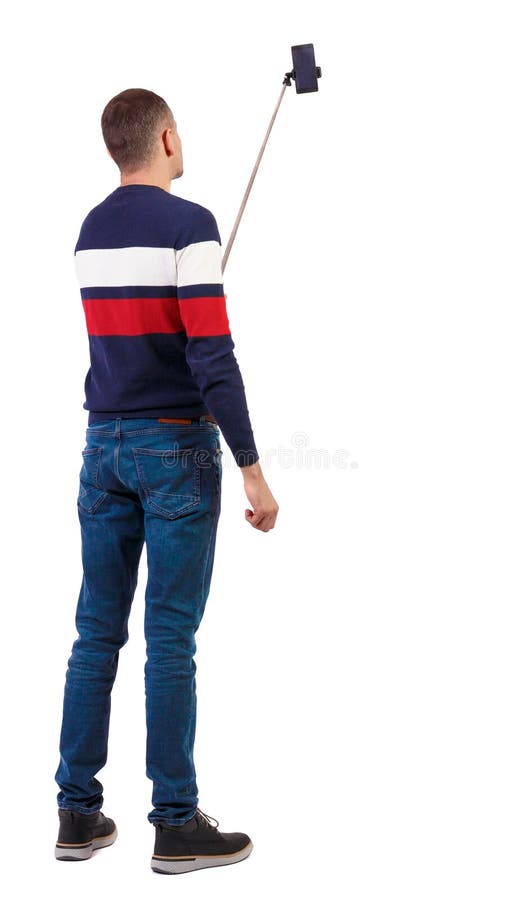 Back View of Standing Young Guy with Smartphone in the Hands of Stock ...
