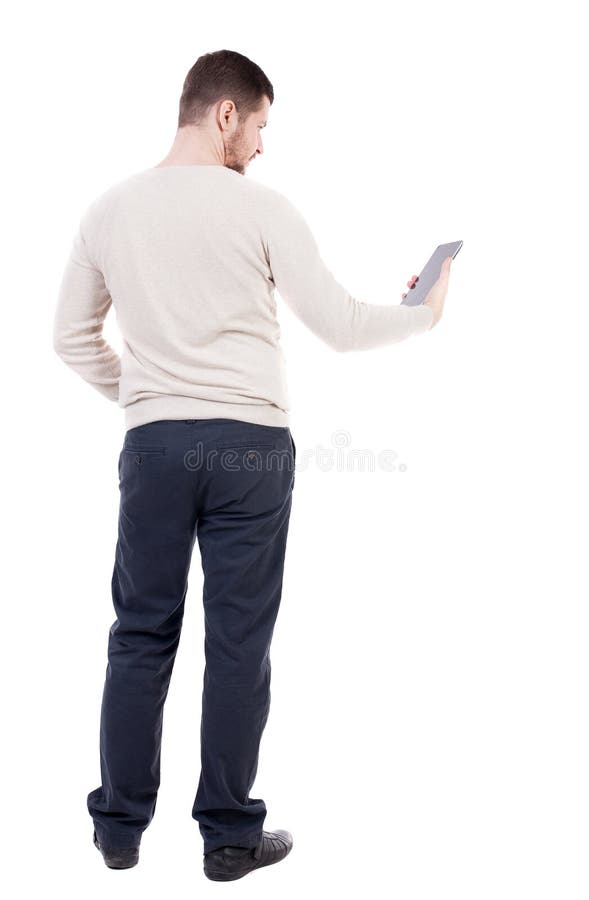 Back View of Standing Young Man with Tablet Computer in the Hand Stock ...