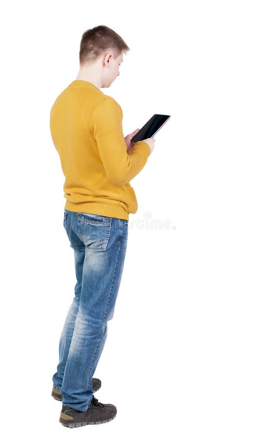 Back View of Standing Young Man with Tablet Computer in the Hand Stock ...