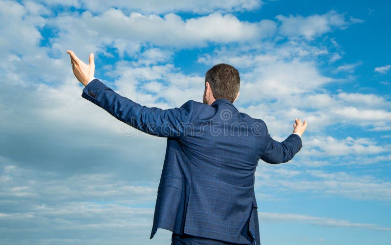 Back View of Successful Business Man Hold Hands Up Outdoor. Successful ...