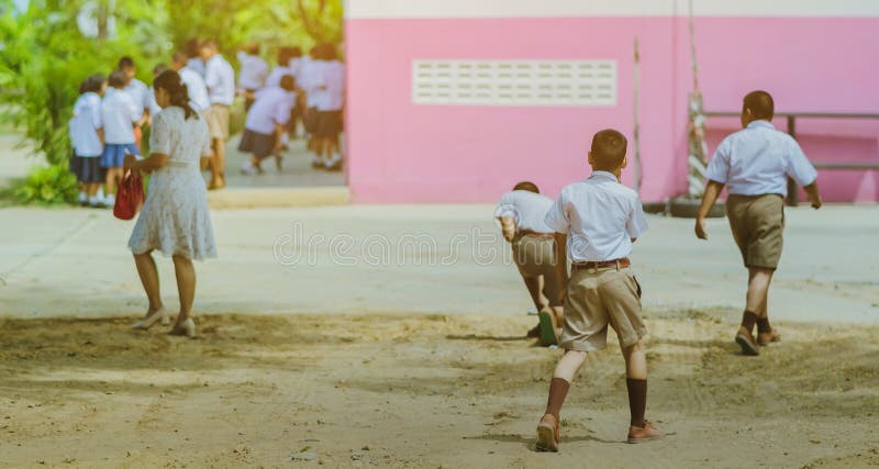 Back View of the Teacher and the Students Walking Go To Study at the ...