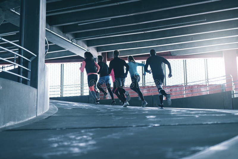 Team of Runners Working Out. Stock Image - Image of crop, lifestyle ...
