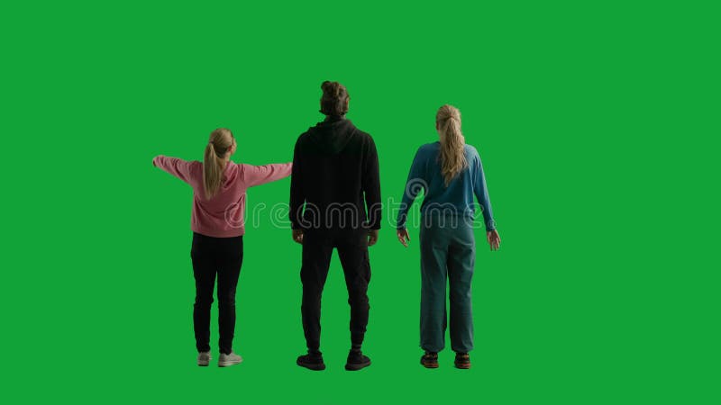 Back View of a Team of Three Campers Synchronously Raising Their Hands ...