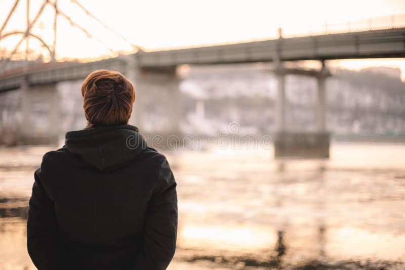 Back View of Thoughtful Young Man Looking at River Stock Image - Image ...