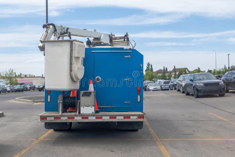 A Back View To a Blue Service Truck with a Crane Stock Photo - Image of ...