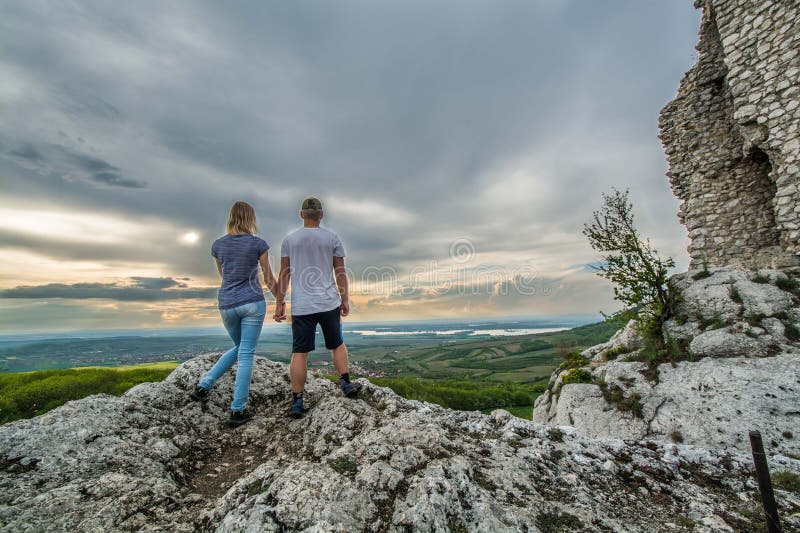 Back View of Two People Looking at Greenery Field Stock Photo - Image ...