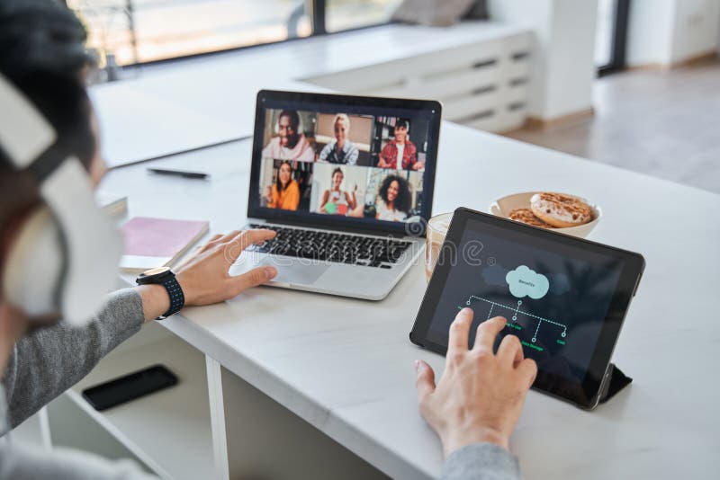 Unrecognizable Man Typing at the Tablet Screen while Having Zoom ...