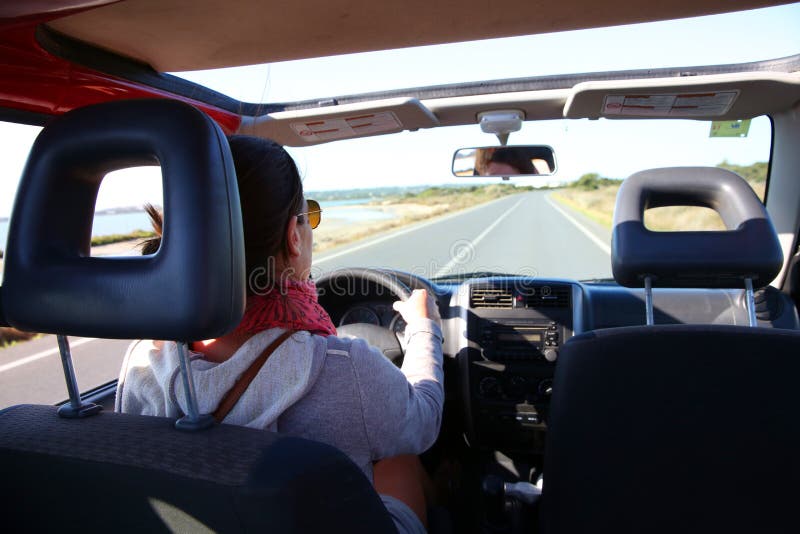 Back View of Woman Driving Car by the Seaside Stock Image - Image of ...