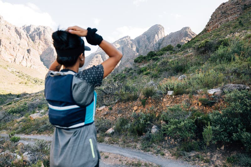 Back View of Woman Hiker Looking in Valley and Enjoying the View, Focus ...
