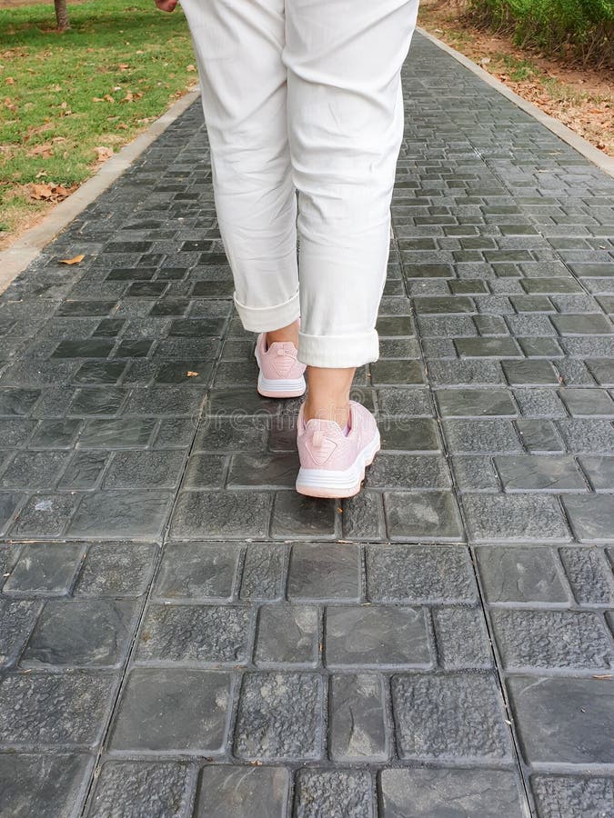 Back View of Woman with Sneakers Walking Stock Photo - Image of ...