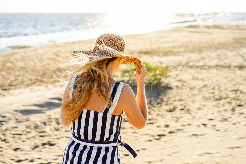 Back View of Woman in Straw Hat Walking Stock Image - Image of latvia ...