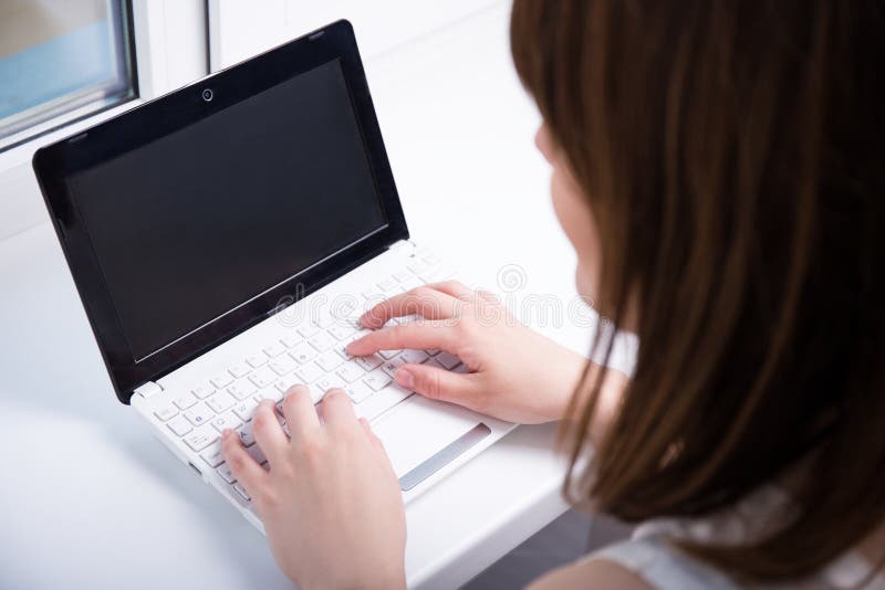 Back View of Woman Using Laptop with Blank Screen Stock Image - Image ...