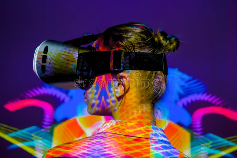 Back View: Woman Using Virtual Reality Headset at Dark Interactive VR ...