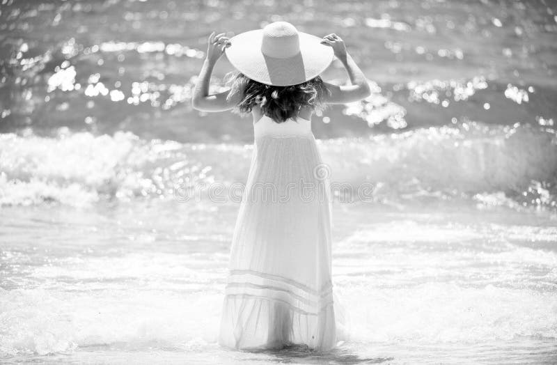 Back View Of Young Attractive Girl With Perfect Body On The Tropical