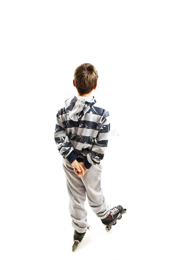 Back View Young Boy on Rollers Looking at Wall. Rear View Stock Image ...