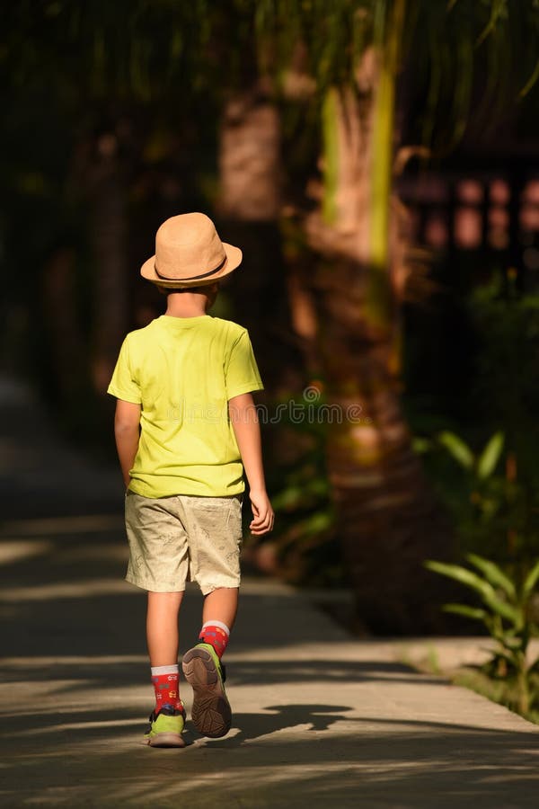 Young boy walking. stock image. Image of white, shirt - 21233129