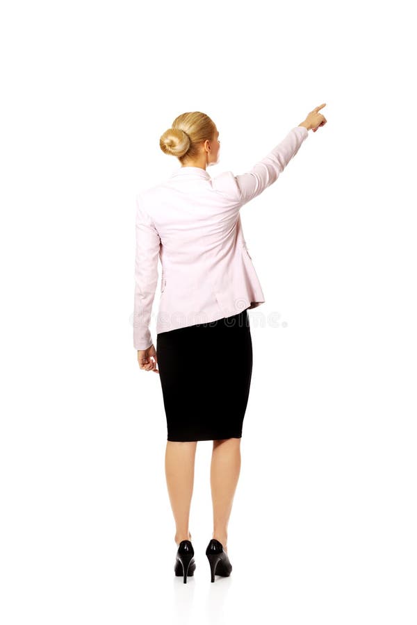 Back View of Young Business Woman Pointing for Somathing Stock Photo ...