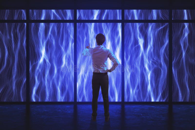 Back View of Young Businessman Standing in Abstract Interior with ...