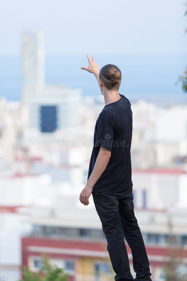 Back View Young Hipster Pulling His Hand Away Stock Photos - Free ...