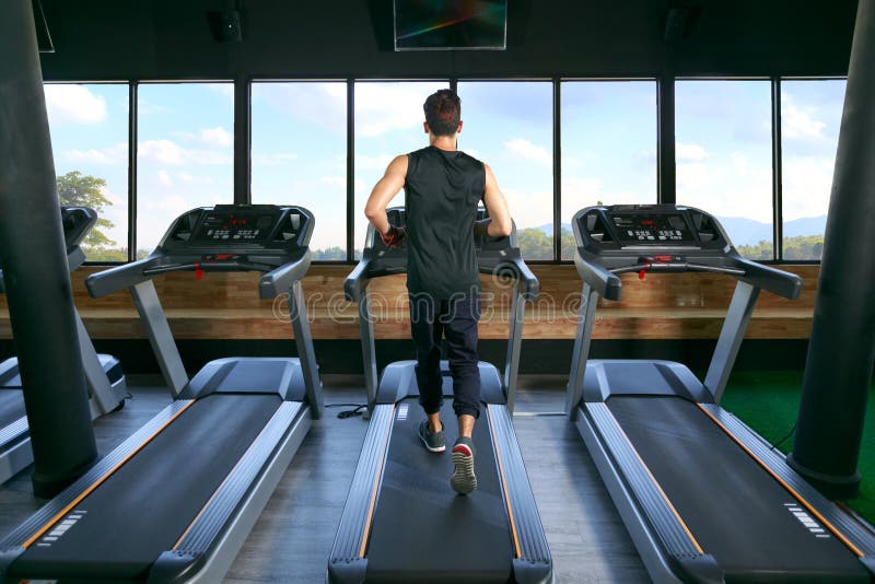 181 Back View Running Man Treadmill Stock Photos - Free & Royalty-Free ...