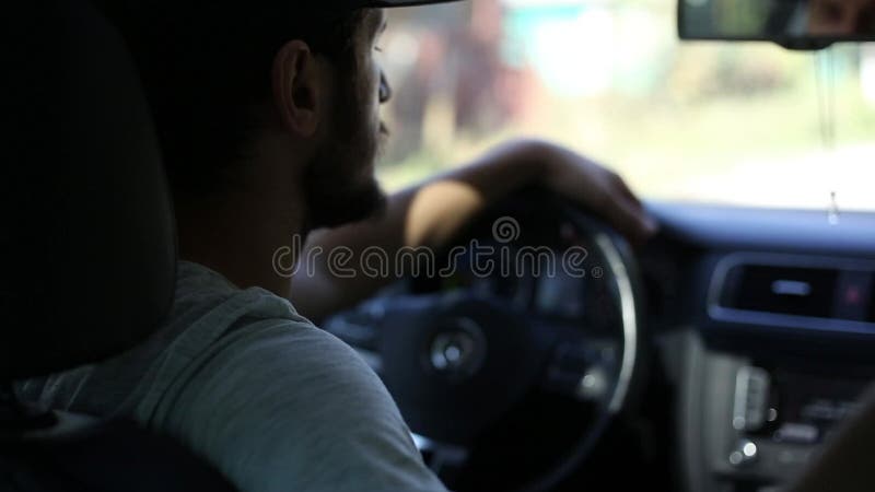 Back View of Young Man Driving the Car. Stock Video - Video of city ...