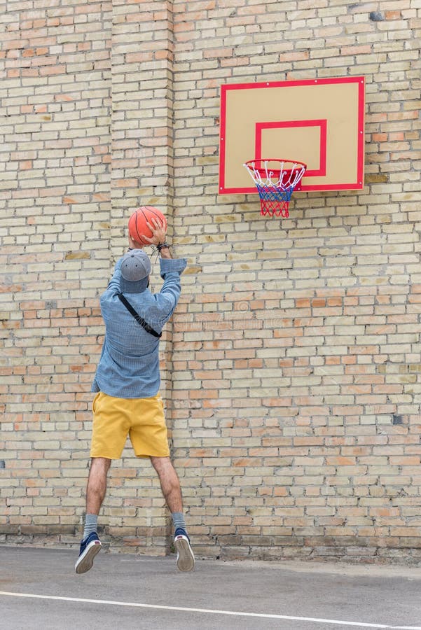Young Man Playing Basketball Alone Stock Image - Image of sport, people ...