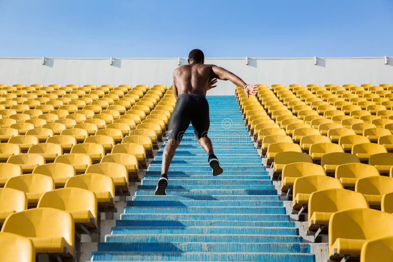 Back View of a Young Man Running Upstairs Stock Image - Image of ...