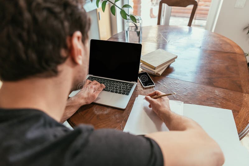 Back View of Young Man Writing Stock Photo - Image of online, computer ...