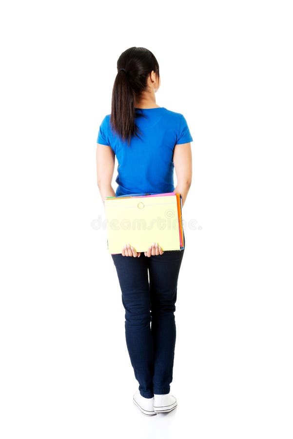 Side View Portrait of a Happy Student Holding Books Stock Photo - Image ...