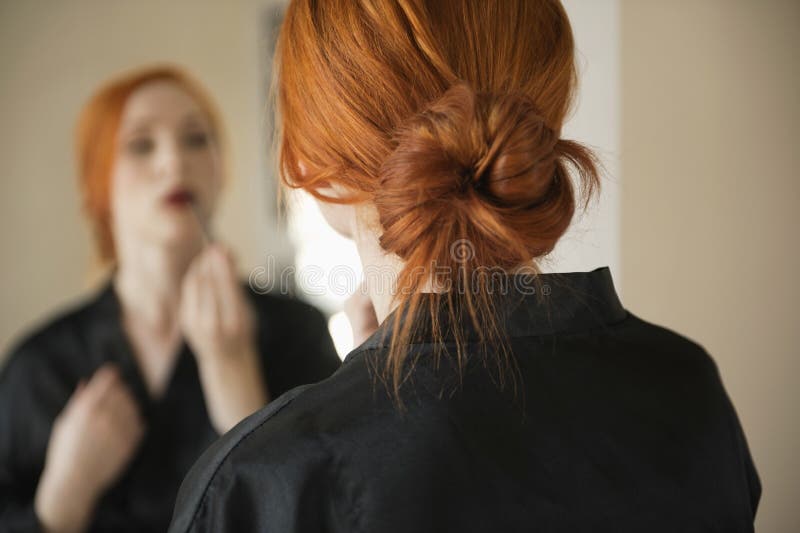 Back View of Young Woman Applying Makeup Stock Photo - Image of indoors ...