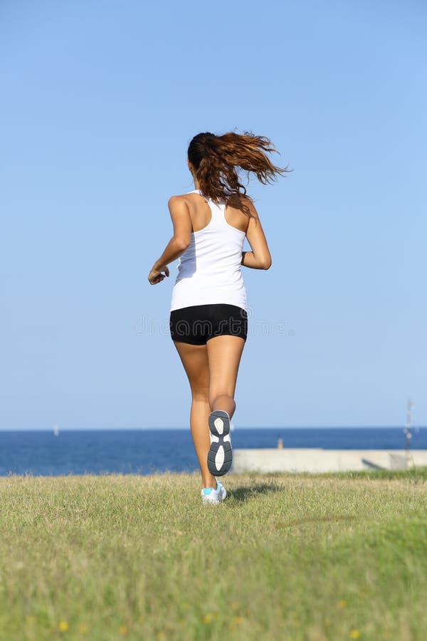 Back View of a Young Woman Running Stock Image - Image of athlete ...