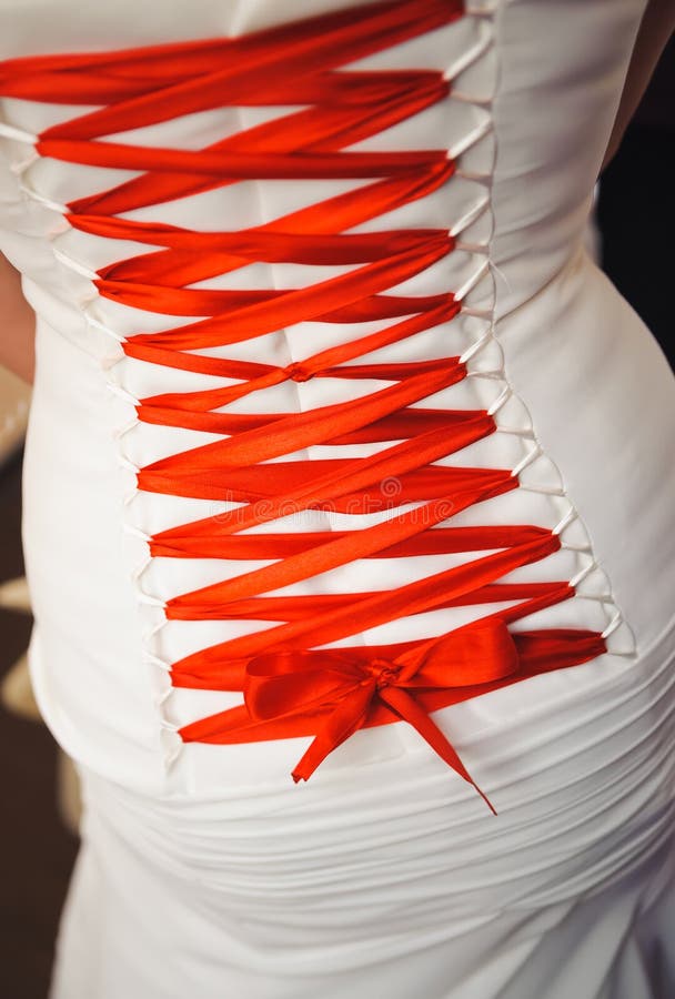 Back of Wedding Dress with Red Ribbon Stock Photo - Image of clothe ...