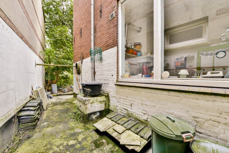 The Back Yard of a House with a Dumpster Editorial Photo - Image of ...