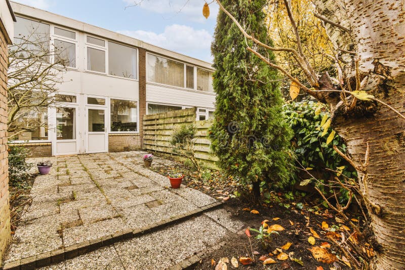 The Back Yard of a House with a Staircase and Stock Image - Image of ...