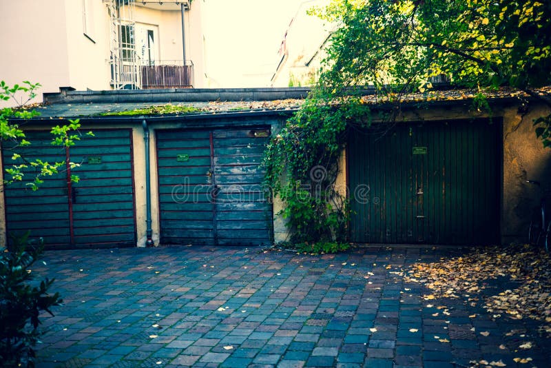 Back Yard with Old Garage Doors, Garage, Old Stock Photo - Image of ...