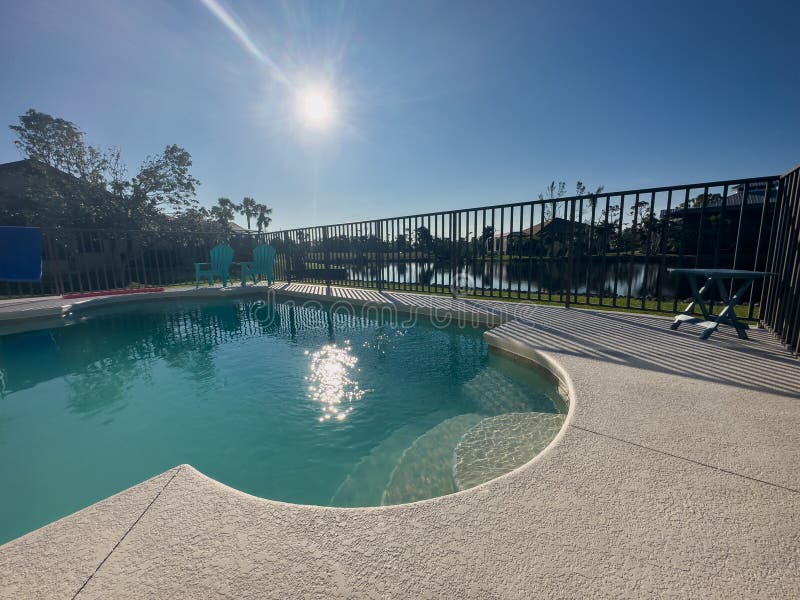 Back Yard with Pool and Garden Blue Skies Stock Image - Image of large ...