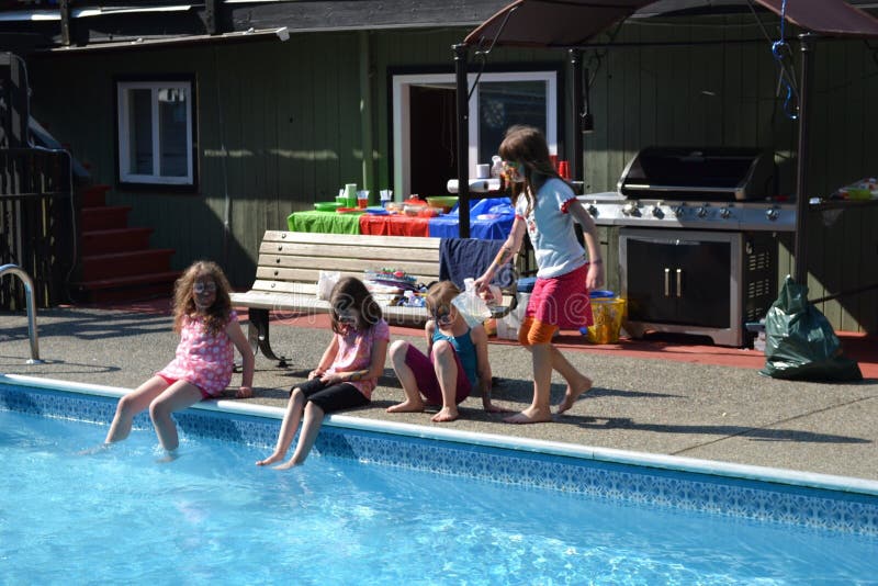 Back yard pool party editorial photo. Image of cotton - 53590976