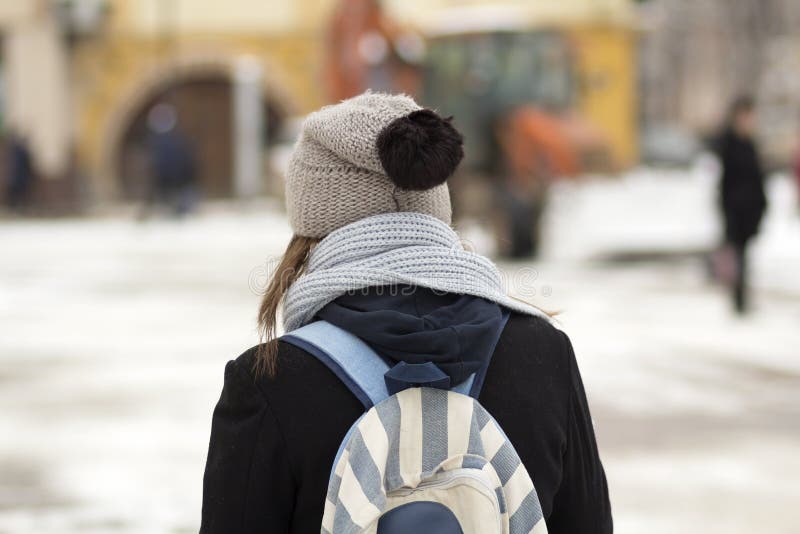 Back of Young Person in Hat with Backpack Stock Photo - Image of ...