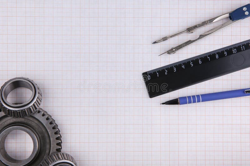 Backdrop with Drafting Accessories, Drafting Paper and Metal Gears with ...