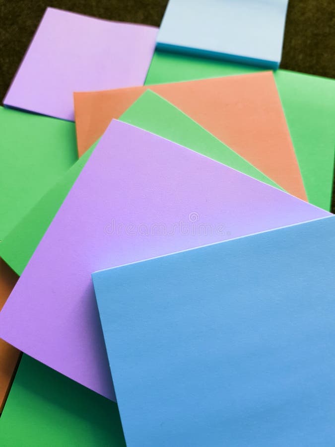 Paper Notebooks for Notes Stacked in Blue, Green and Purple Colors ...