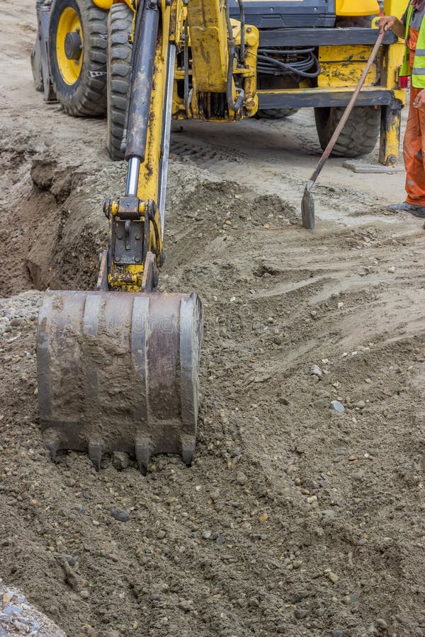 Backfill a trench stock photo. Image of installation - 44599534