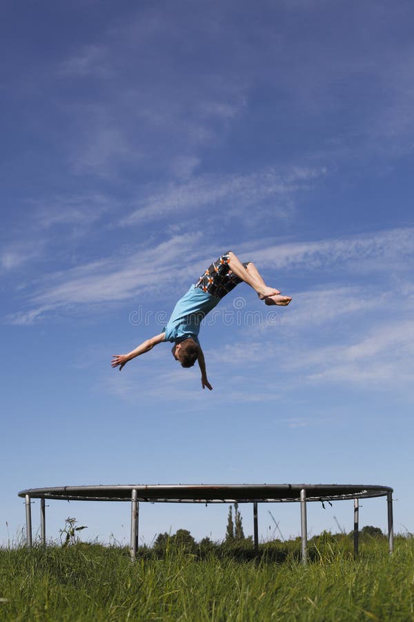 Trampoline backflip stock image. Image of athletic, beauty - 14260781