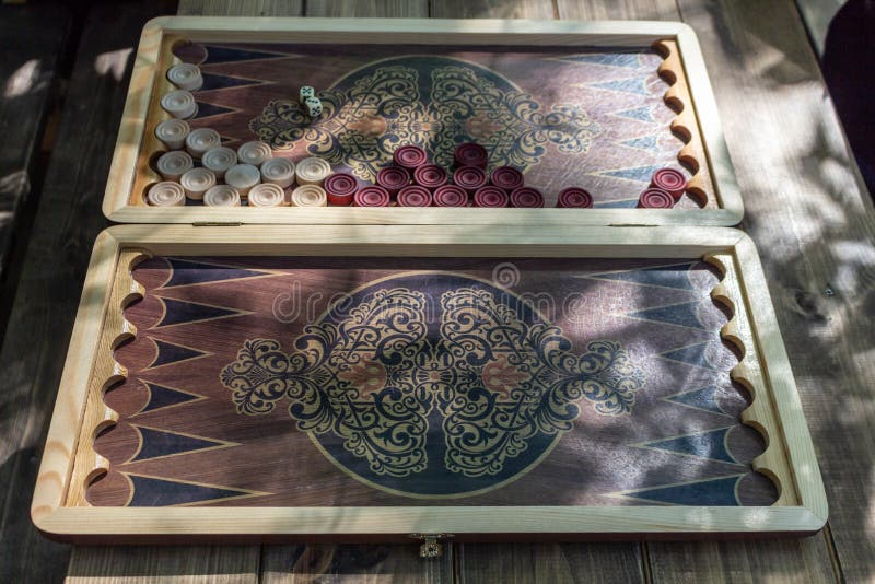 Backgammon Board Game for Two Players on a Special Board. Sun Rays ...