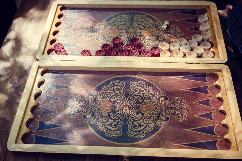 Backgammon Board Game for Two Players on a Special Board. Sun Rays ...