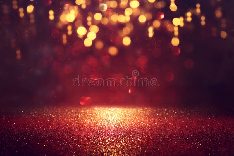 Background of Abstract Red and Gold Glitter Lights. Defocused Stock ...